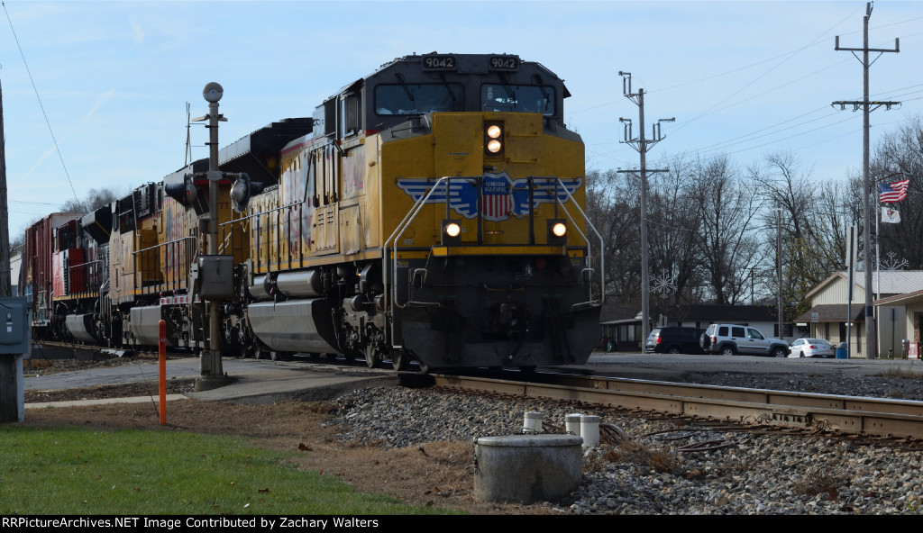 UP 9042 7739 CN 8899